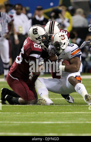 Auburn running back Michael Dyer (5) bounces out of the tackle of South ...