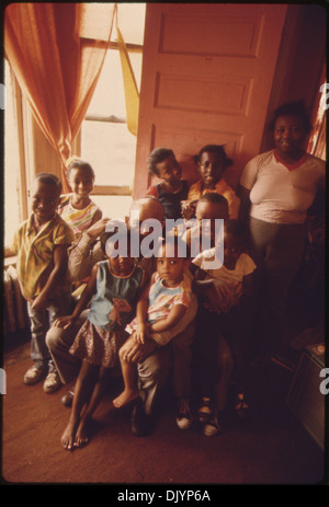 Black mother and father with their eight children in Chicago's South ...