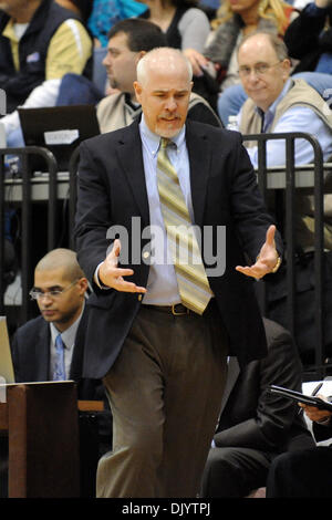 St. Bonaventure head coach Mark Schmidt draws up a play during a time ...