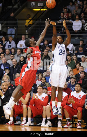 Villanova guard Corey Stokes (24) takes the shot over Syracuse forward ...