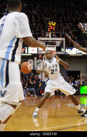 Villanova Guard Corey Stokes #24 drives against St. Josephs Guard ...