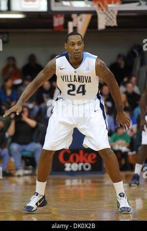 Villanova guard Corey Stokes (24) takes the shot over Syracuse forward ...