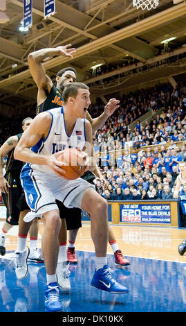 Duke forward Miles Plumlee (21) wrestles with Miami (Ohio) guard ...