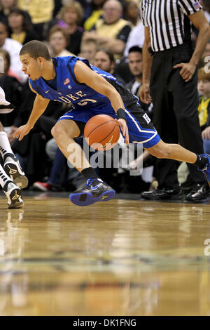 Duke guard Seth Curry (30) knocks the ball away from Wake Forest guard ...
