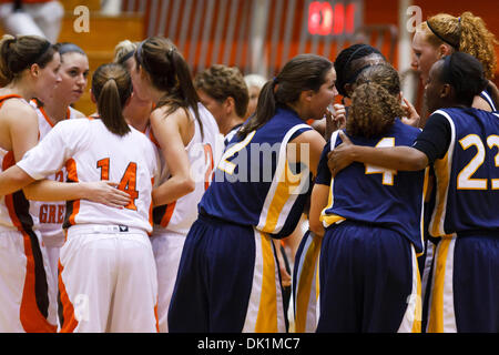 Bowling Green players huddle during an NCAA college basketball game ...
