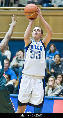 Haley Peters #33 of Duke shoots over Suriya McGuire #33 of Miami during ...