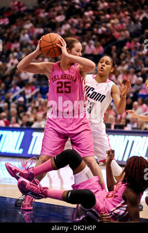 Oklahoma guard Whitney Hand (25) is helped off the court by strength ...
