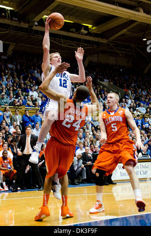 Kyle Singler of Duke (12) shoots over Andrew Smith of Butler (44 ...