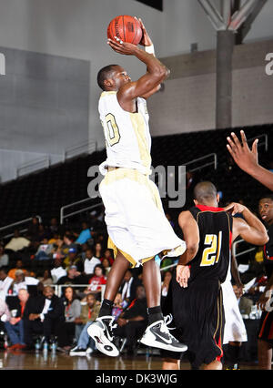 Kenderek Washington (20) of the Alabama State Hornets boxes out Brian ...