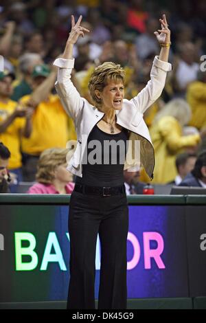 Baylor women's basketball coach Kim Mulkey, front, answers questions ...