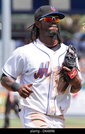 New York Mets Grapefruit League hat on a fielding glove during an MLB ...