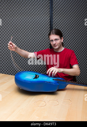 Removing the old strings of an electro-acoustic guitar ( Series with ...