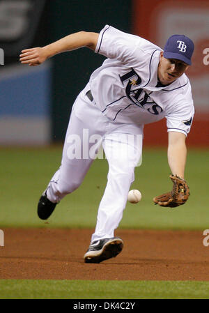 Tampa Bay Rays shortstop Elliot Johnson leaps over Cleveland Indians ...