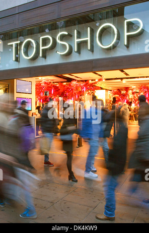 business people rushing in a entrance at a airport Stock Photo - Alamy