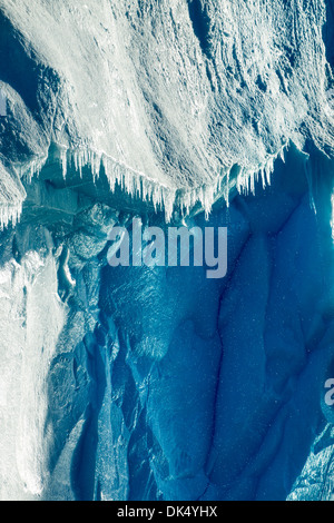 Antarctica, Deception Island, Icicles hang from massive tabular iceberg ...