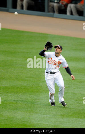 Baltimore Orioles' Nick Markakis makes a leaping catch on a hit by ...