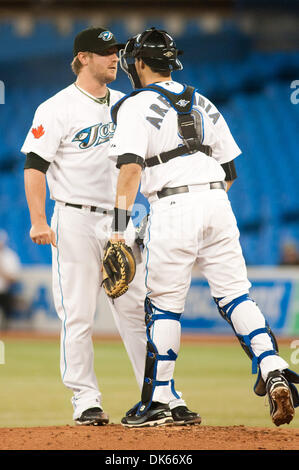 Chicago White Sox catcher Kyle Teel, left, and pitcher Jordan Leasure ...