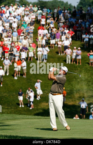 Phil Mickelson. chips to the green on the 18th hole during the second ...
