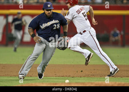 Arizona Diamondbacks first base Josh Naylor, left, shakes hands with ...