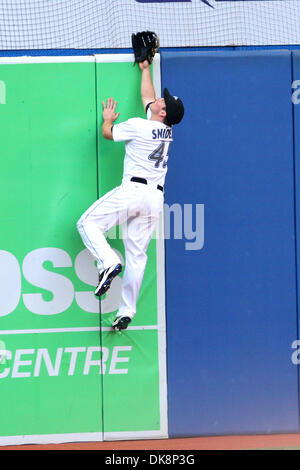 Toronto Blue Jays' Travis Snider scores against the Cleveland Indians ...