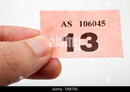 Raffle ticket with number thirteen Stock Photo - Alamy