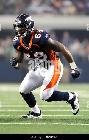 Von Miller of the Denver Broncos rushes the quaterback against the New ...