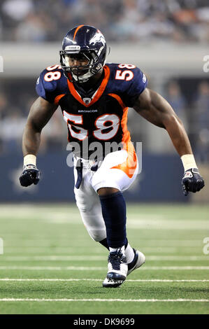 Von Miller of the Denver Broncos rushes the quaterback against the New ...