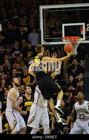 IOWA CITY, IA - DECEMBER 20: Iowa coach Jan Jenson talks to her team ...