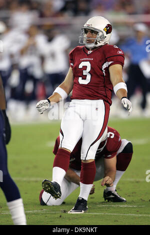Arizona Cardinals kicker Jay Feely, left, kicks a 35-yard field goal as ...