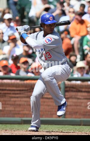 Chicago Cubs shortstop Starlin Castro, top, takes a high throw from ...