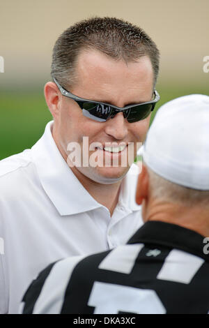 Northwestern head football coach Pat Fitzgerald talks to a radio show ...