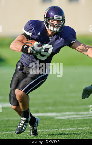 Northwestern tight end Drake Dunsmore runs a drill at the NFL football ...