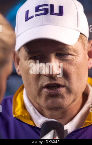 LSU Tigers head coach Frank Wilson III looks at his call sheet during a ...