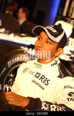 Indian Formula One driver Narain Karthikeyan of HRT steers his car ...