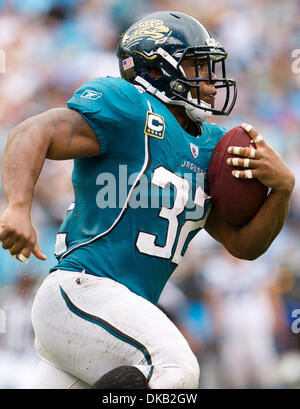 Jacksonville Jaguars running back Maurice Jones-Drew (32) is taken down ...