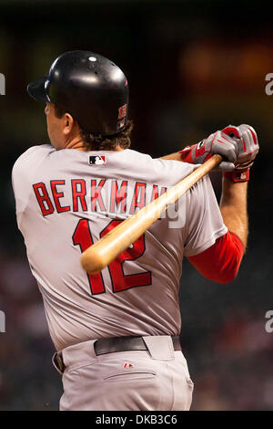 Houston Astros' Lance Berkman, right, runs the bases behind Milwaukee ...