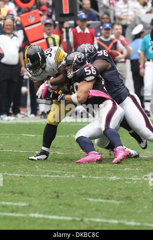 Brian Cushing (56) of the Houston Texans pulls in an interception and ...