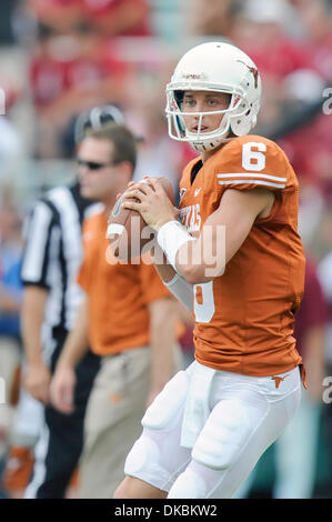 Case McCoy of the Texas Longhorns warms up on the sideline verse the ...