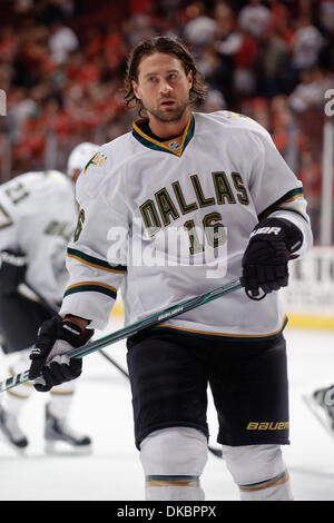 Chicago Blackhawks right wing Adam Burish celebrates with the Stanley ...