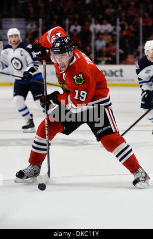 Winnipeg Jets' Jonathan Toews (19) redirects the puck past Vancouver ...
