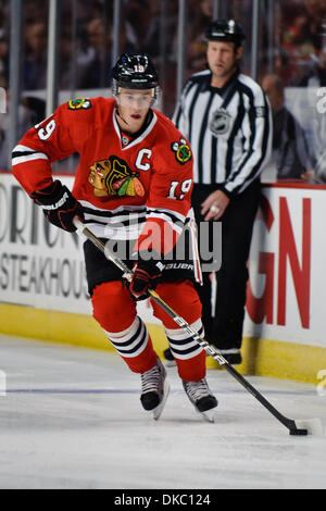 Winnipeg Jets' Jonathan Toews (19) redirects the puck past Vancouver ...