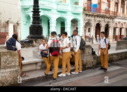 Teenage Cuban schoolchildren, schoolboys, in uniform in the morning ...