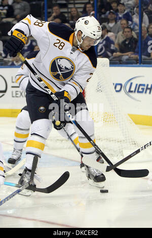 Buffalo Sabres' Paul Gaustad (28) hits Calgary Flames' Alex Tanguay (40 ...