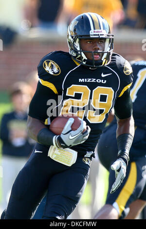 Missouri wide receiver Jerrell Jackson, left, drops a pass as Iowa ...