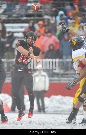 Rutgers quarterback Gary Nova (15) looks to throw a pass in the snow ...
