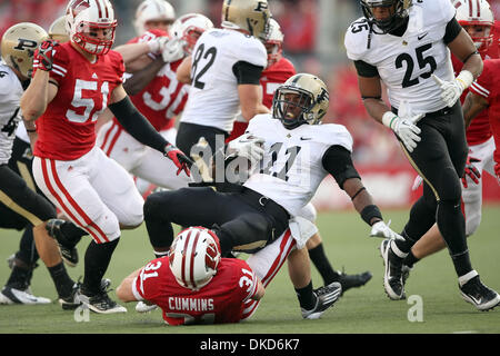Purdue running back Akeem Hunt (1) runs away from Nebraska defensive ...