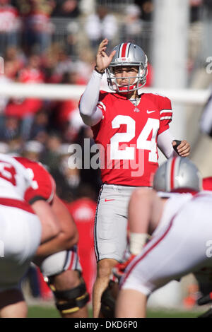 Ohio State kicker Drew Basil (24) tackles Wisconsin wide receiver Jared ...