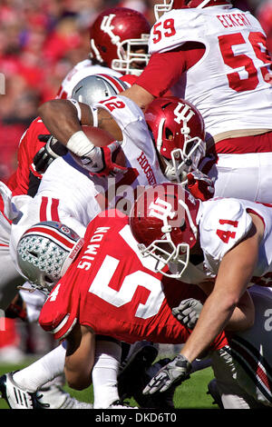 Indiana running back Stephen Houston (12) rushes the ball upfield ...