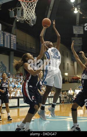 North Carolina forward LaToya Pringle (30) fights off Louisville guard ...