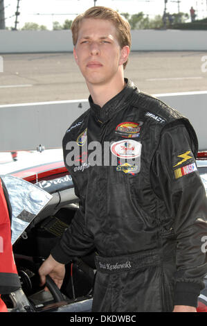NASCAR Busch Series driver Brad Baker (37) slides backwards out of Turn ...